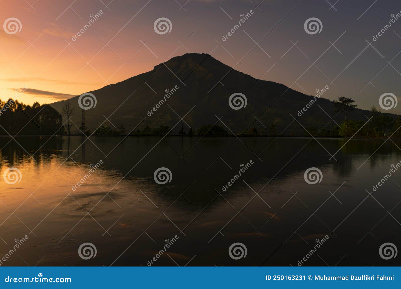 Sunrise with Mount Sumbing with Lake Surface on the Foreground Stock ...