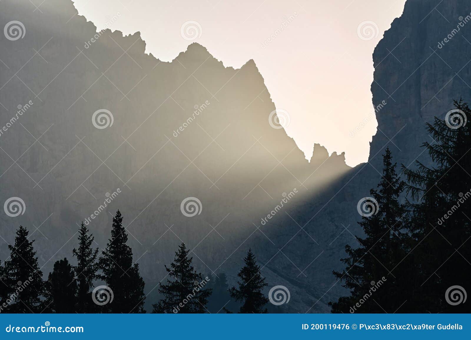 Sunrise between Mountain Cliffs Stock Photo - Image of misty, light ...