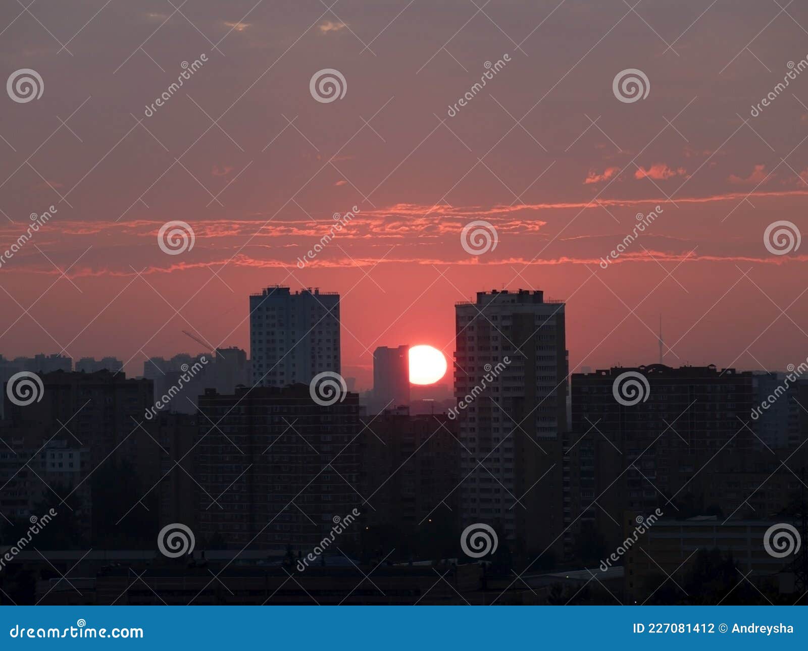 Sunrise Over the City. the Sun Rises Above the Horizon Stock Photo ...
