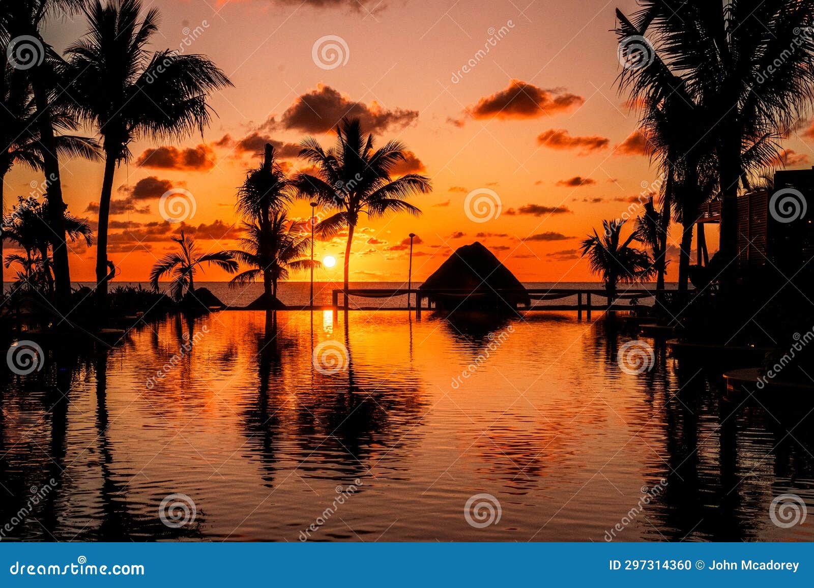 Sunrise Over the Gulf of Mexico Reflected into the Infinity Pool at the ...