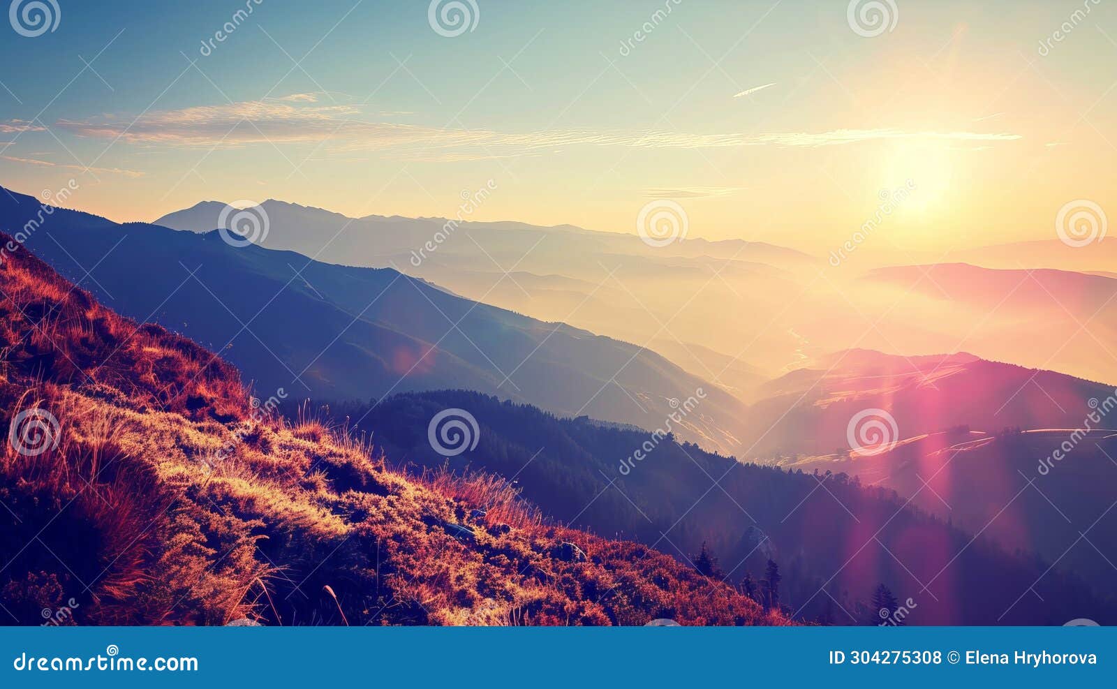 Sunrise Over Layered Mountain Ranges with a Gradient Sky and Light Rays ...