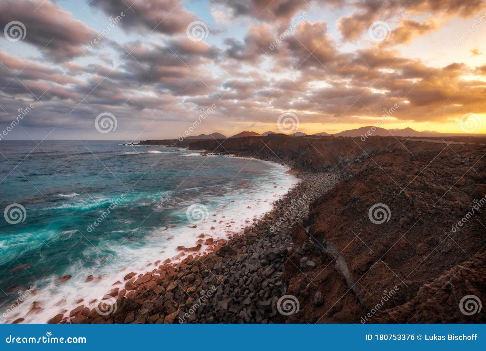 Sunrise Over the Mountains and Ocean Stock Photo - Image of blue, cliff ...