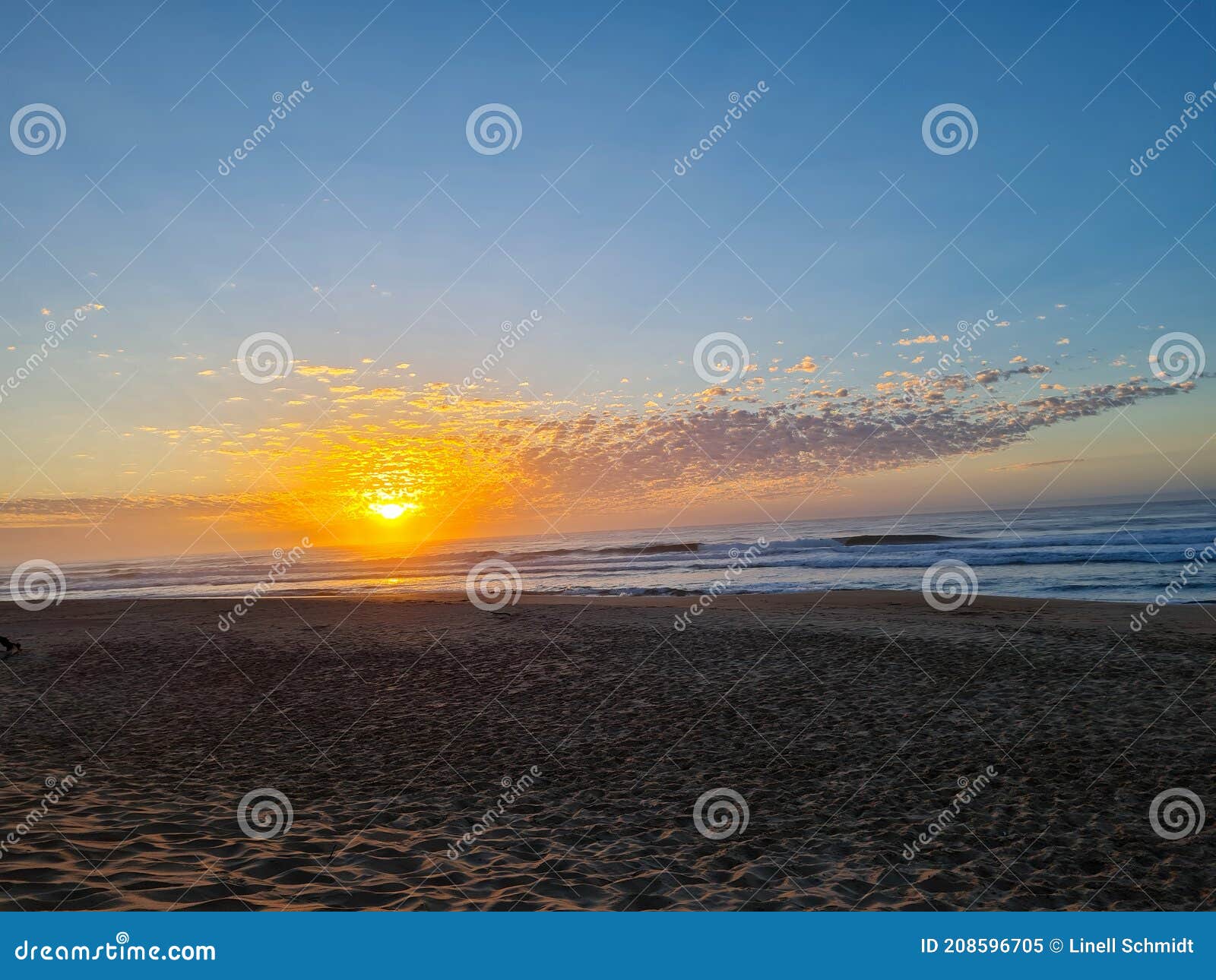 Sunrise Over Ocean with Clouds and Blue Sky Stock Image - Image of ...