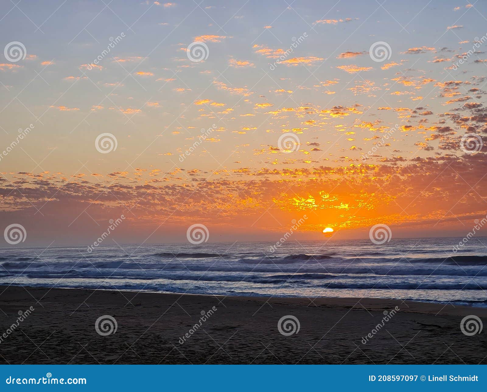 Sunrise Over Ocean with Clouds and Blue Sky Stock Image - Image of ...
