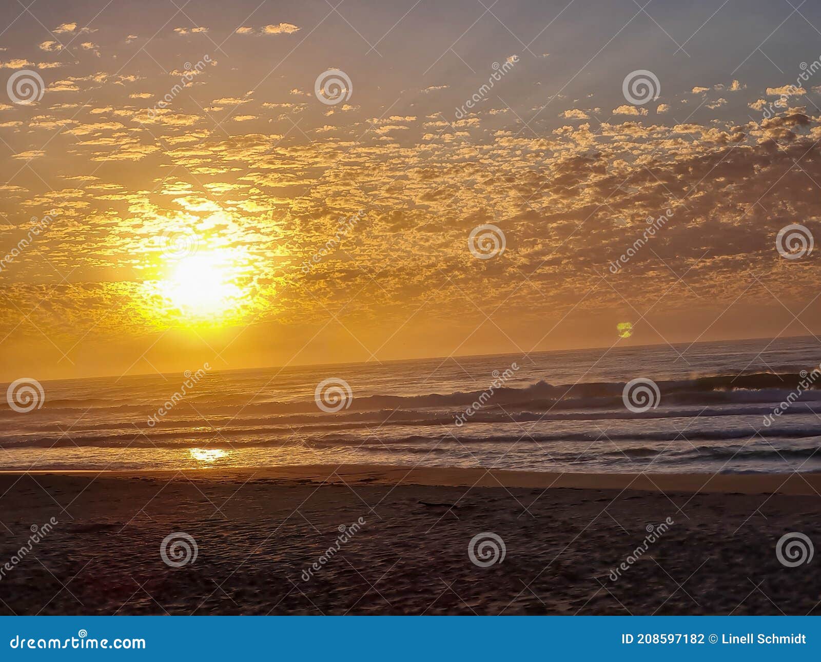 Sunrise Over Ocean with Clouds and Blue Sky Stock Photo - Image of ...