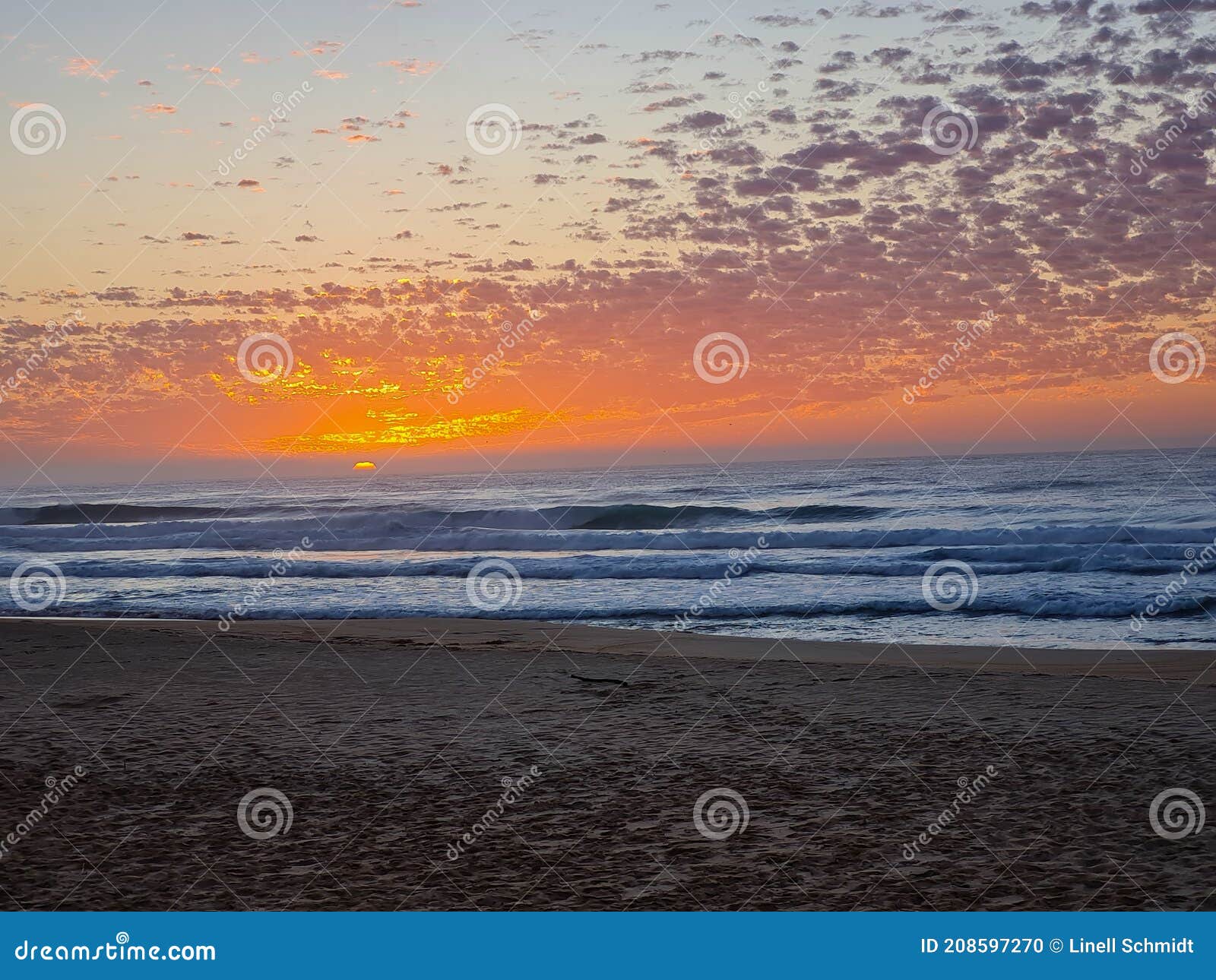 Sunrise Over Ocean with Clouds and Blue Sky Stock Photo - Image of ...