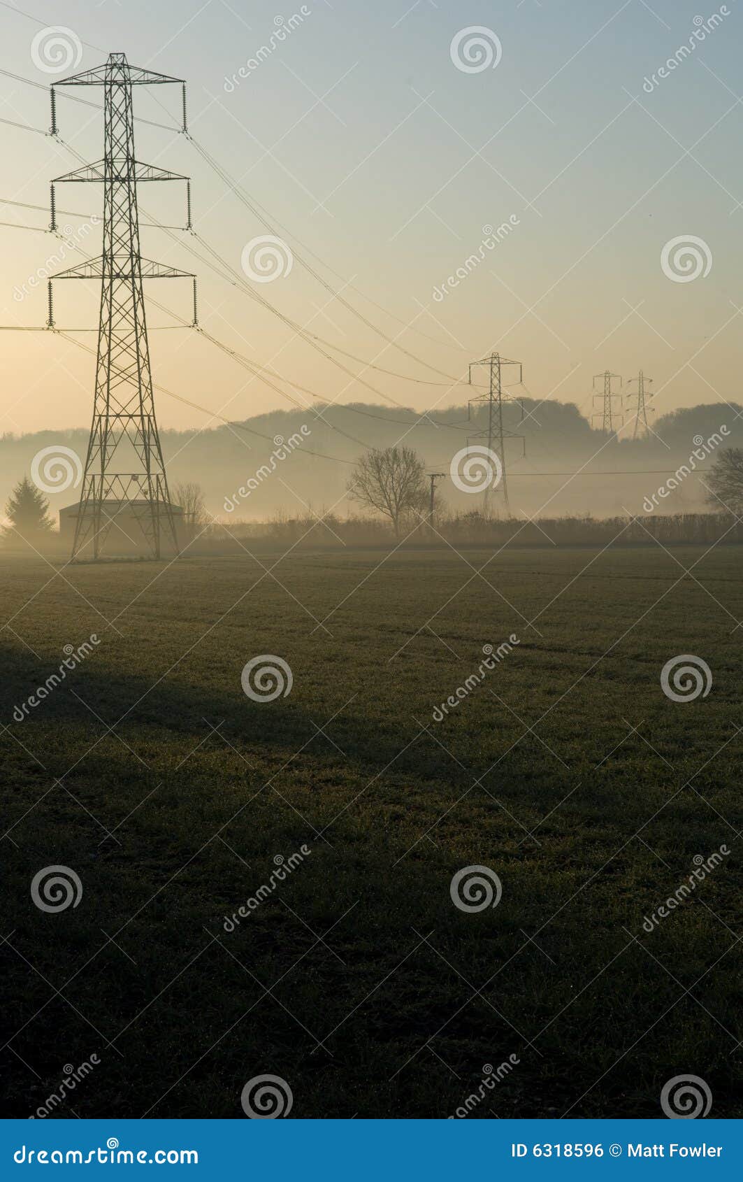 Sunrise over pylon field stock photo. Image of sunset - 6318596