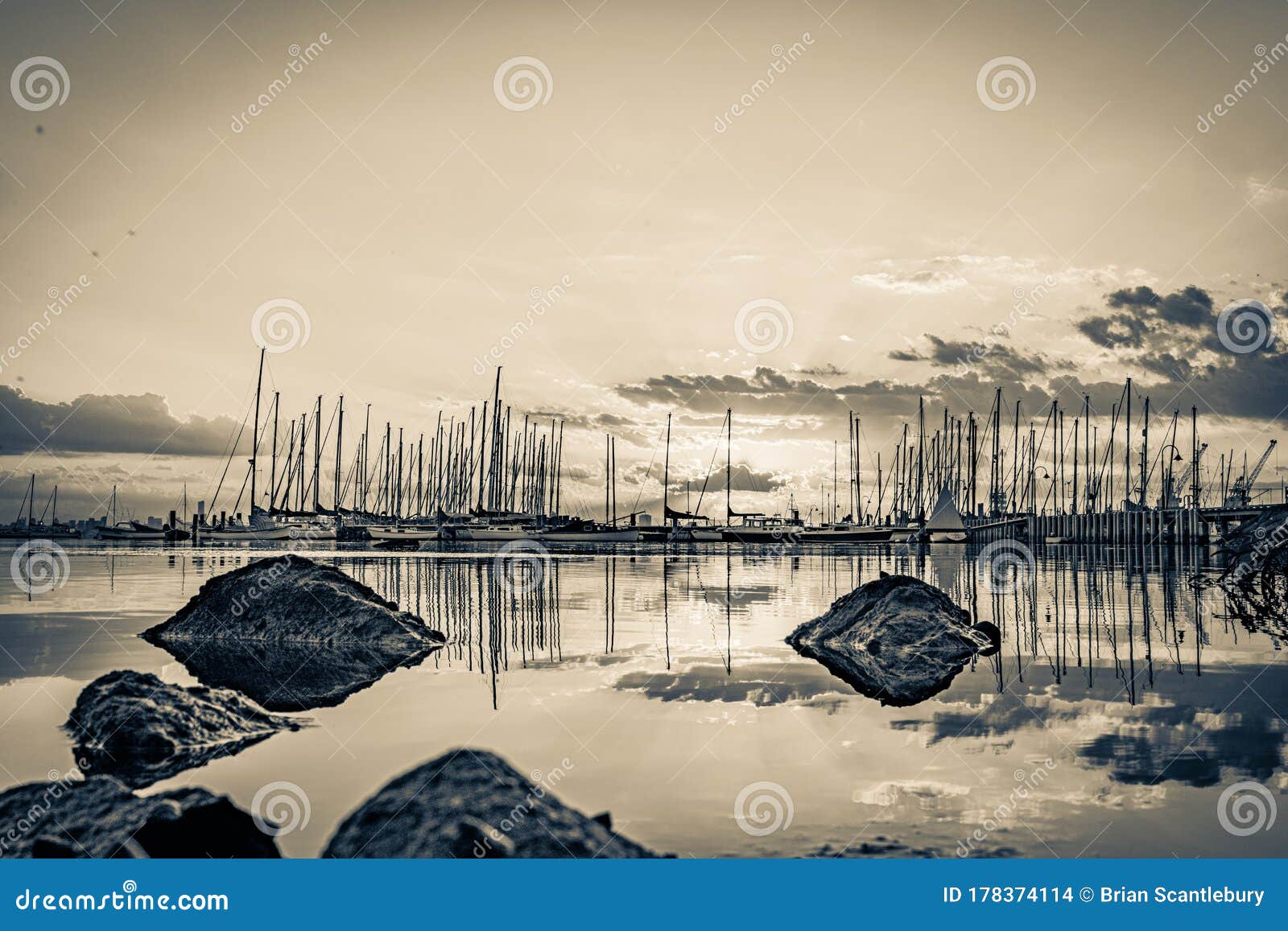 Sunrise Over Waterfront and Boats Stock Photo - Image of light, pier ...