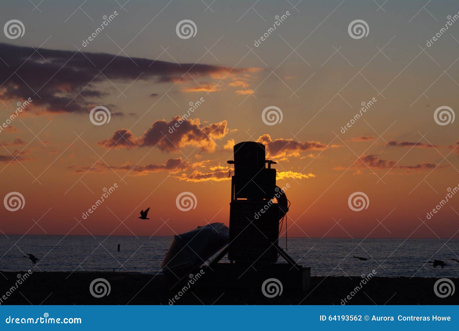 Sunrise in Racine stock photo. Image of beach, boat, lifeguardchair ...