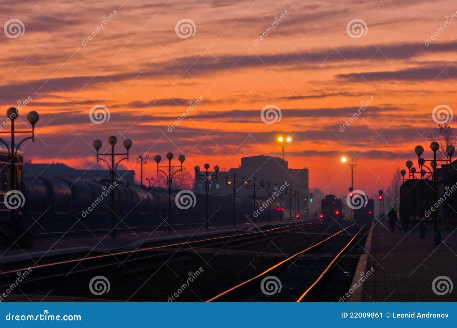 Sunrise in a Railway Station Stock Image - Image of dusk, outdoors ...