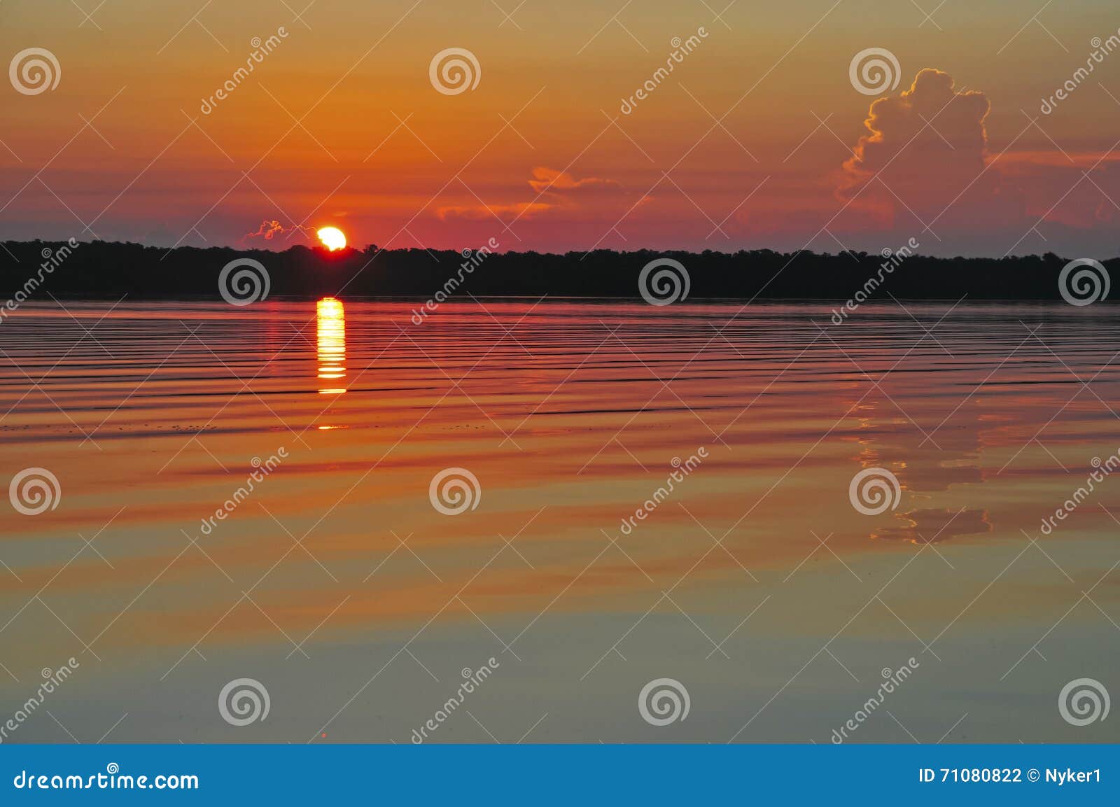 Sunrise with Reflection in Calm Water Stock Photo - Image of beach ...