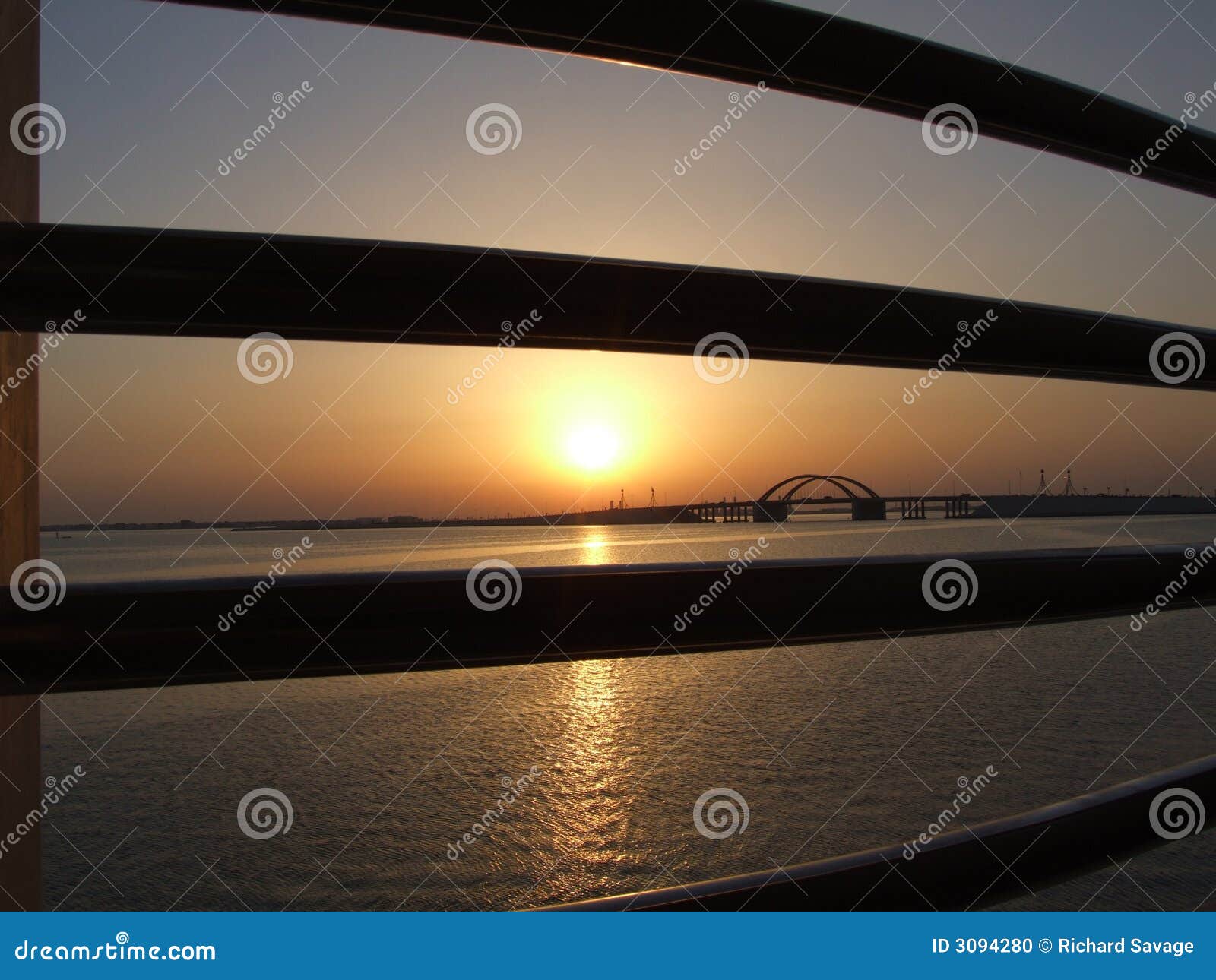 Sunrise by sea in Bahrain stock photo. Image of headland - 3094280