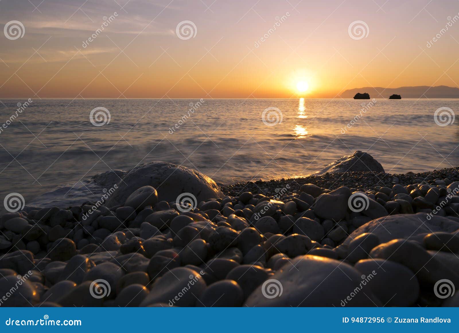 Sunrise, Sea and Pebbles Beach Stock Photo - Image of beach, nature ...