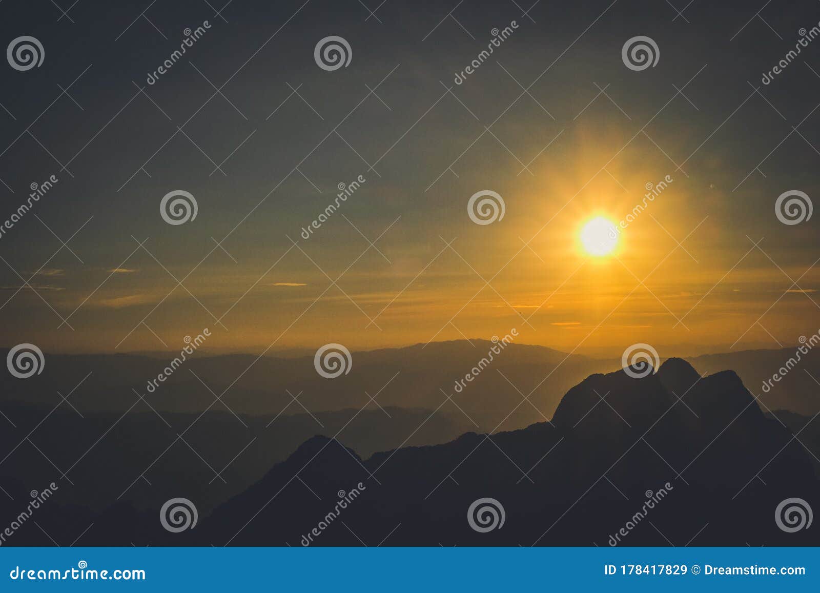 Sunrise Sky Backlit with Big Mountain Stock Image - Image of angry ...