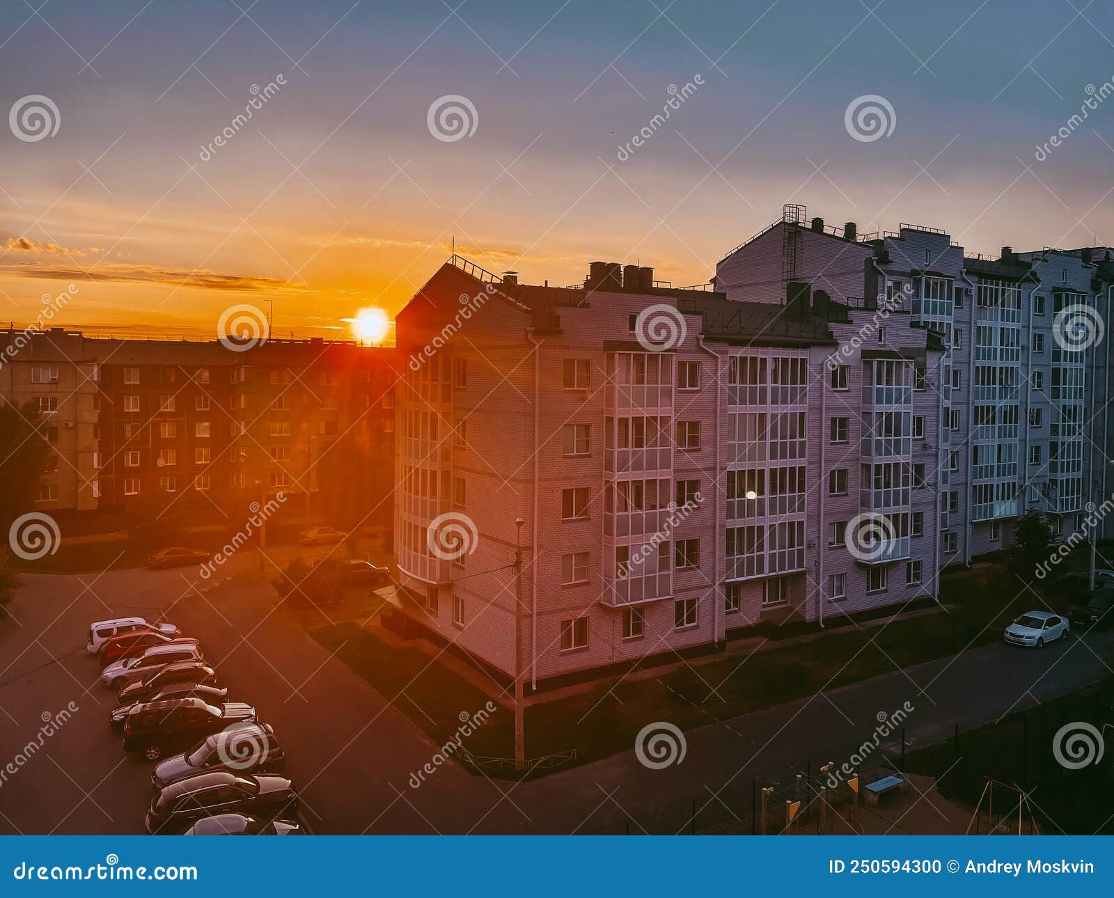 Sunrise in a small town stock photo. Image of town, sunrise - 250594300