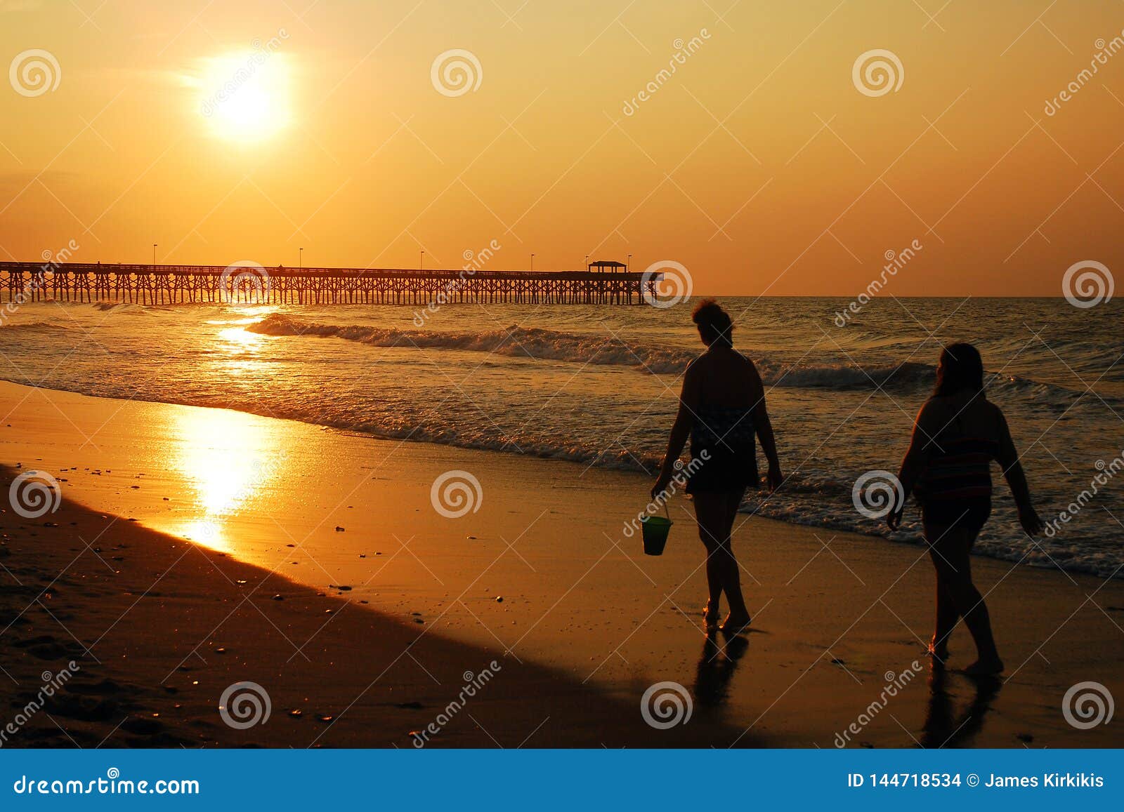 Sunrise Stroll Along the Coast Editorial Stock Image - Image of landmark, people: 144718534