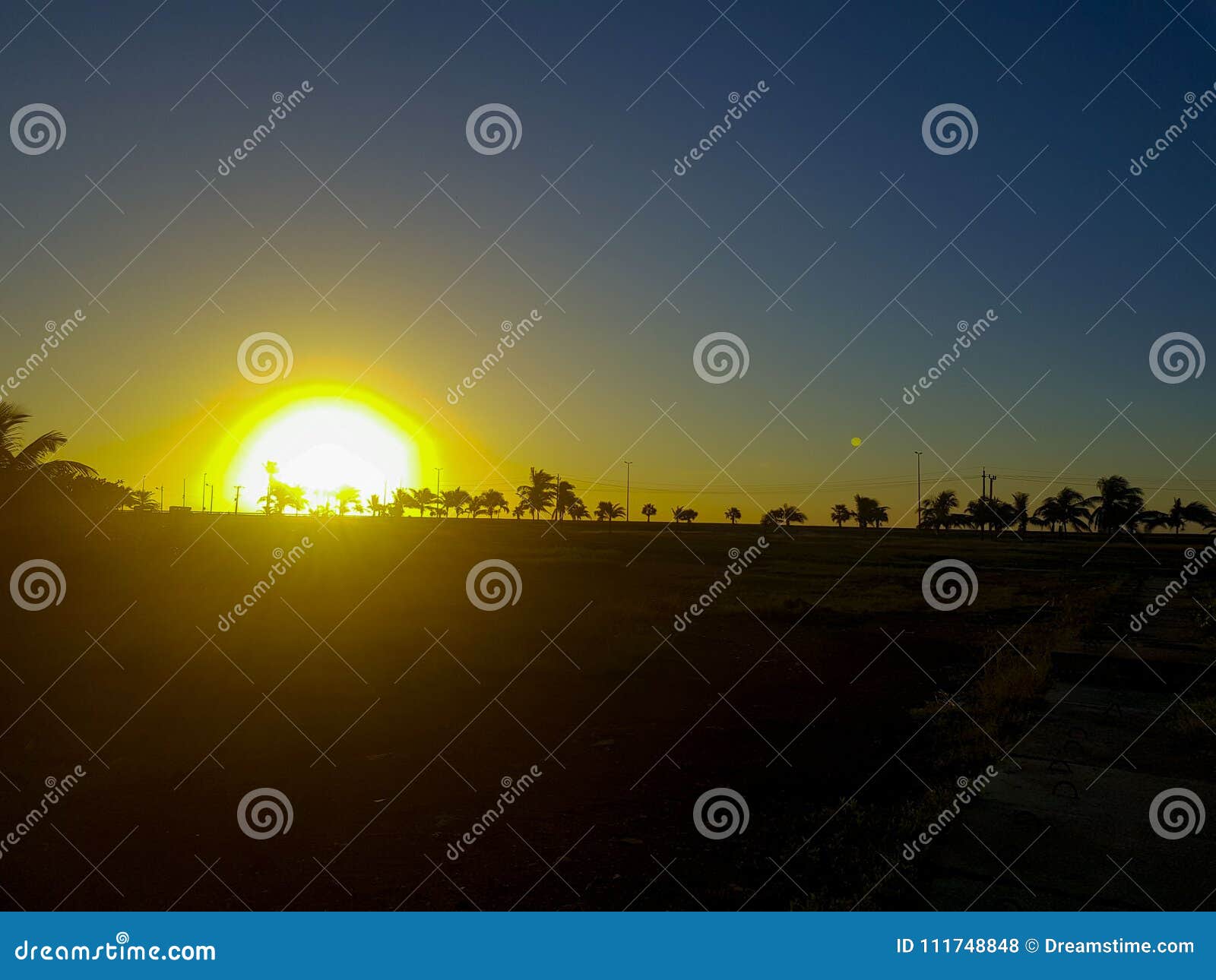 Sunrise with Sun and Moon in Cuba Stock Photo - Image of scenic, phase ...