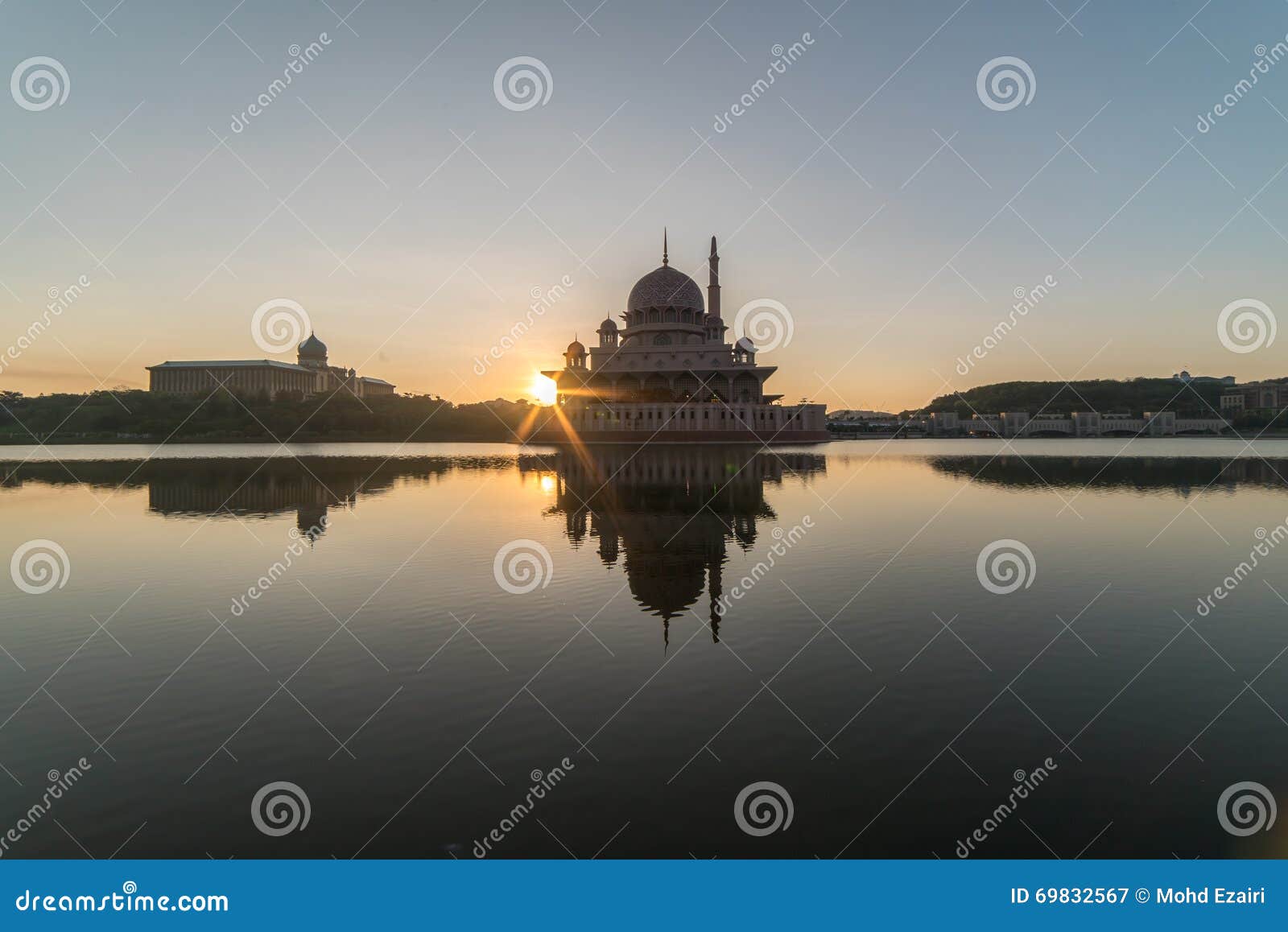 Sunrise with Sunburst Sunstar Behind Silhouette Mosque Stock Image ...