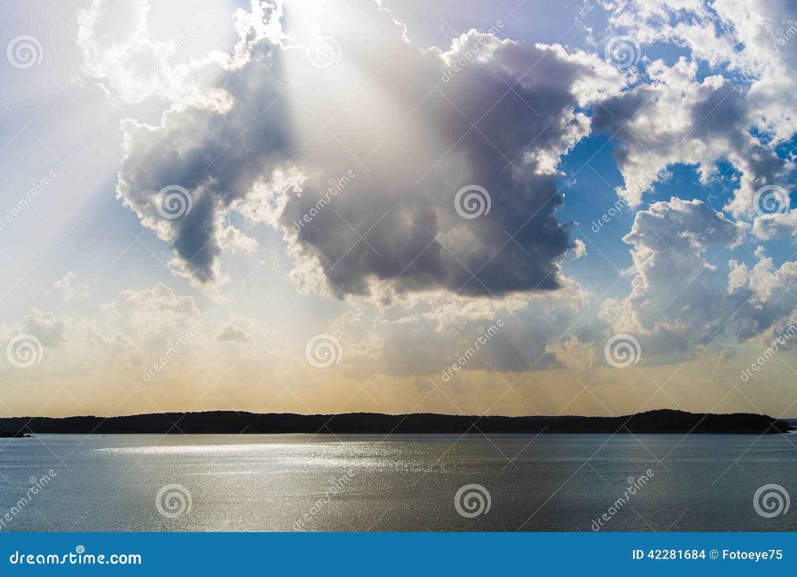 Sunrise / Sunset Light Rays Over Lake Stock Photo - Image of cloud ...