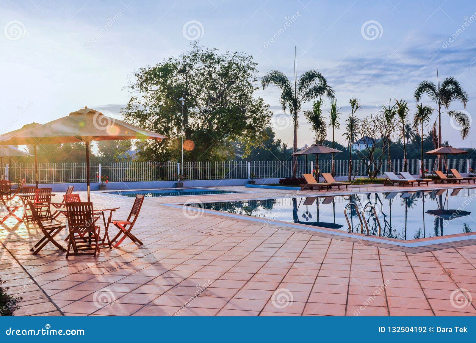 Sunrise at Swimming Pool stock photo. Image of luxury - 132504192