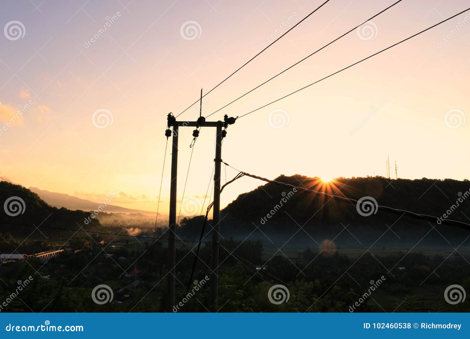 Sun rising from a hill stock photo. Image of hill, landscape - 102460538