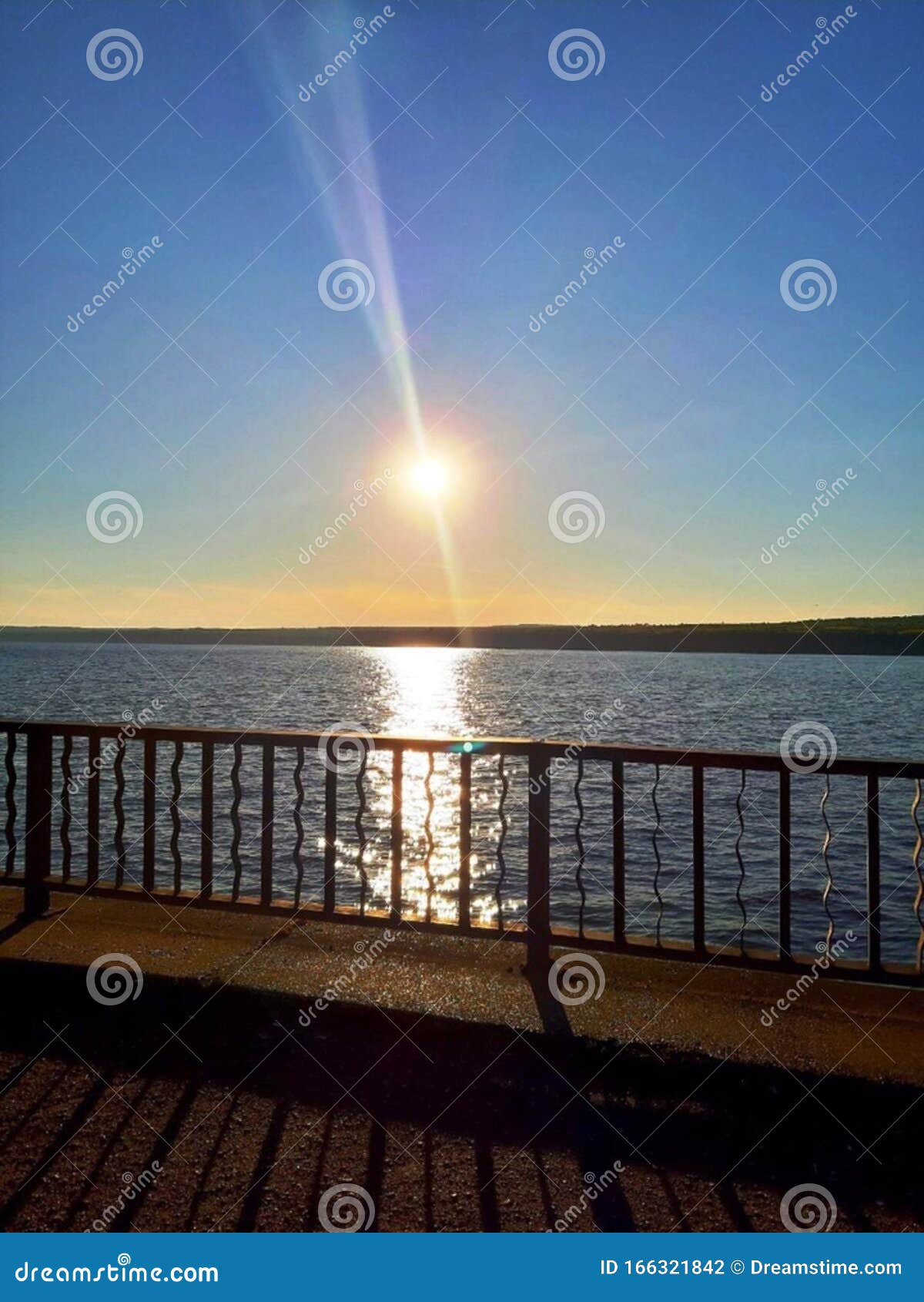 Sunrise on the waterfront stock photo. Image of nature - 166321842