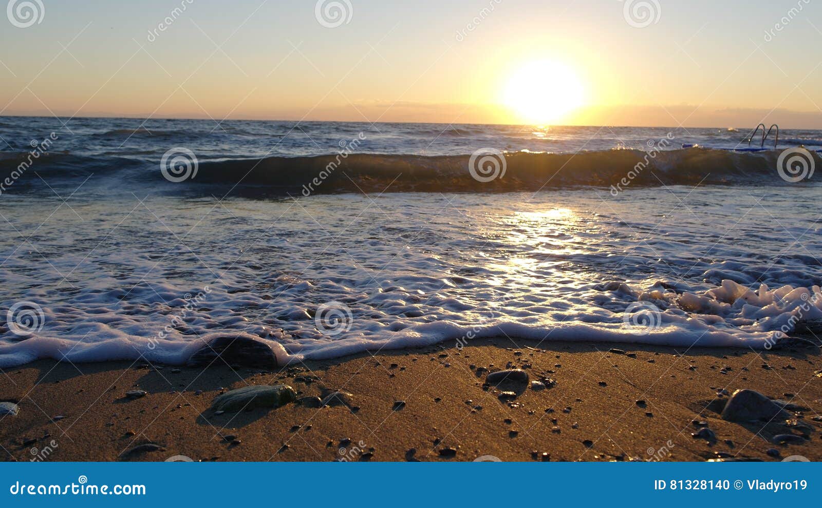 Sunrise from the waves stock photo. Image of sunset, rock - 81328140