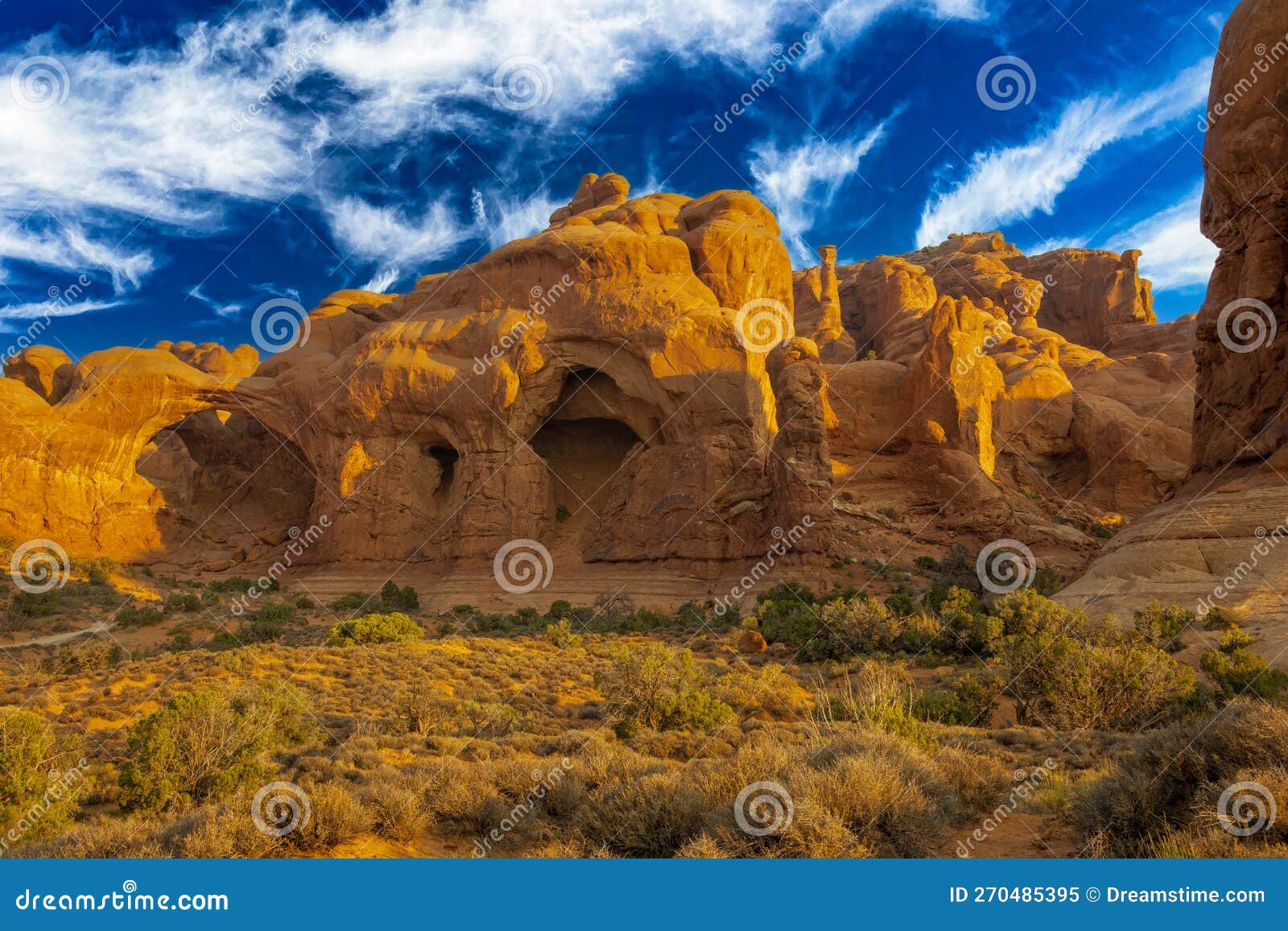 Sunrise Over the Double Arch in the Windows Section of Arches National ...