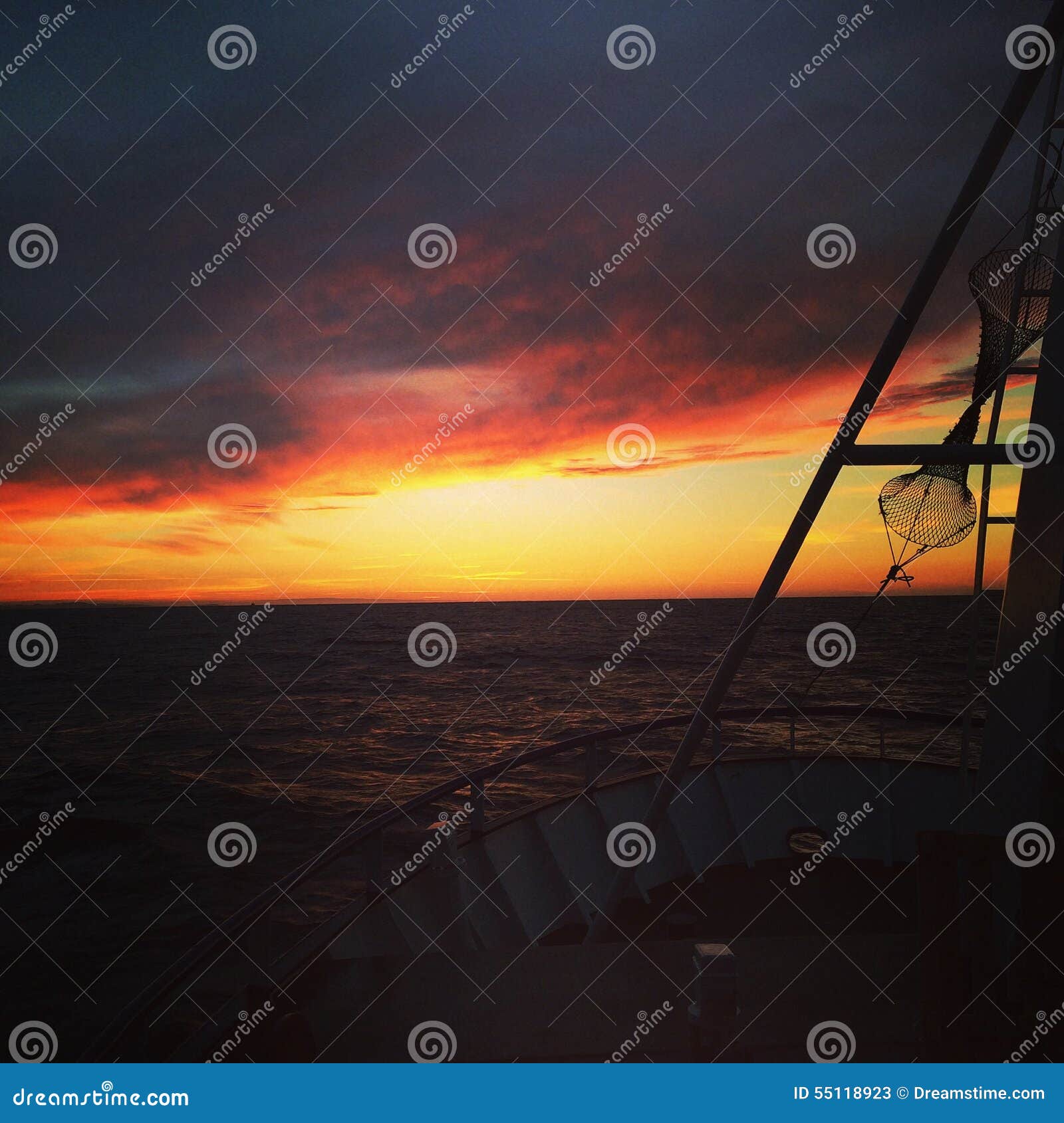 Sunrise at work stock image. Image of boat, sunrise, sunset - 55118923