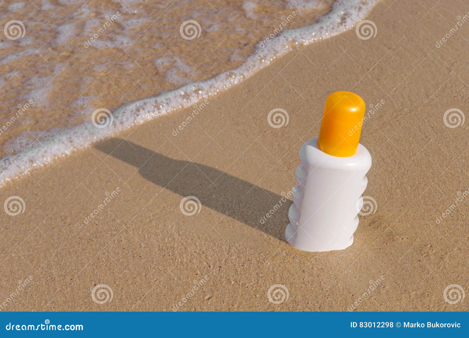 Sunscreen Cream Bottle on the Beach Stock Photo - Image of moisturizer ...
