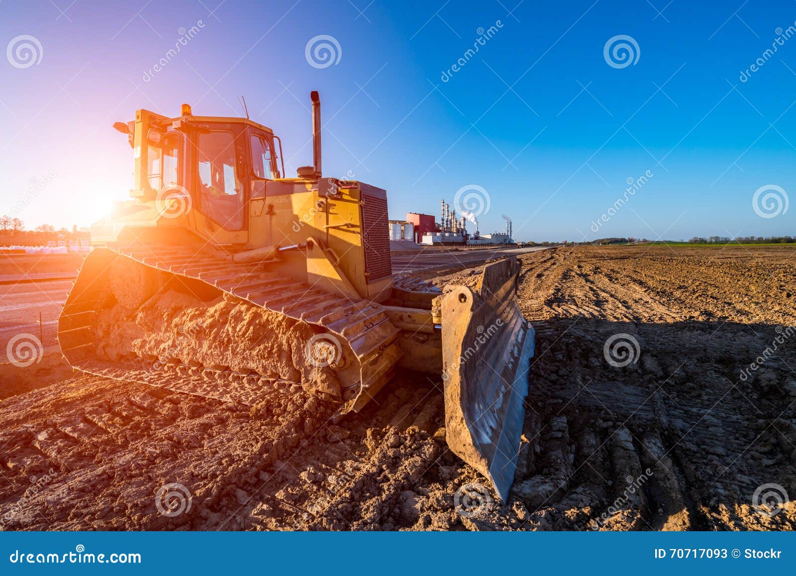 Sunset Above the Bulldozer Working on the Construction Site Stock Image ...
