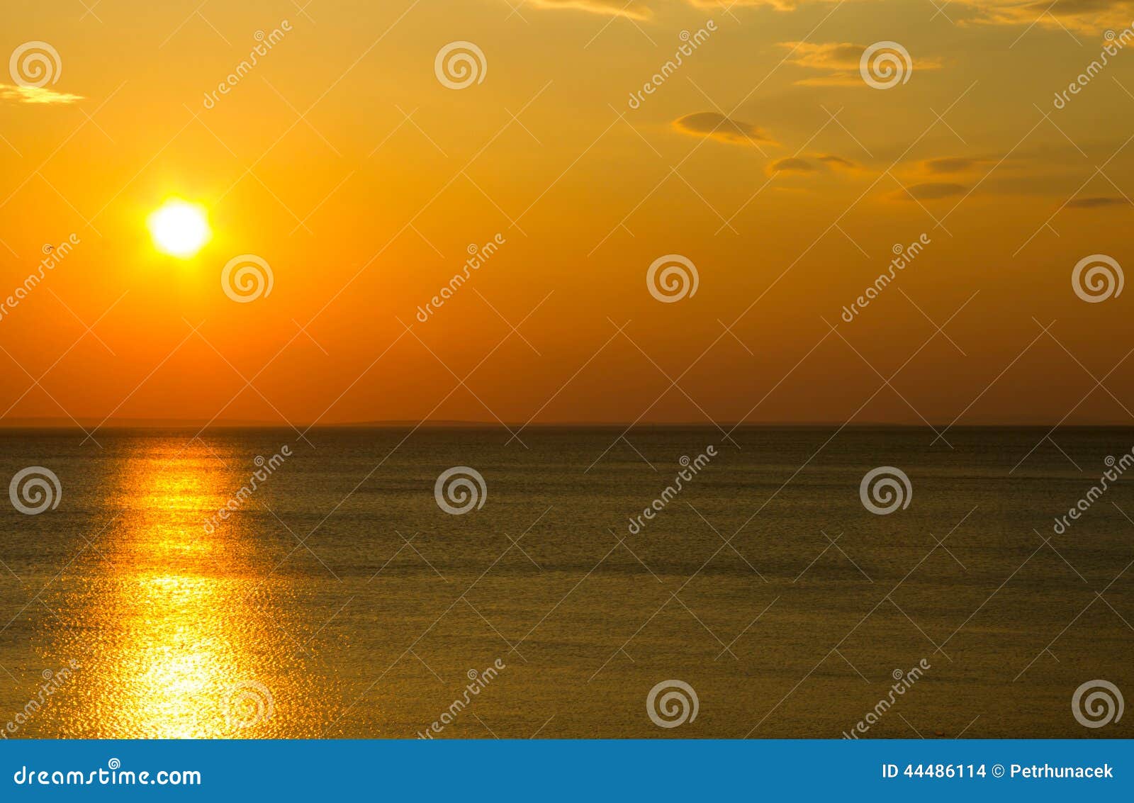 Sunset above sea level stock photo. Image of heat, scene - 44486114