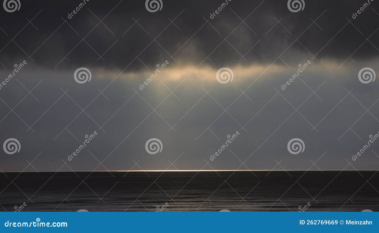 Sunset at the Adrian Sea with Dark Clouds and Spectacular Reflection ...