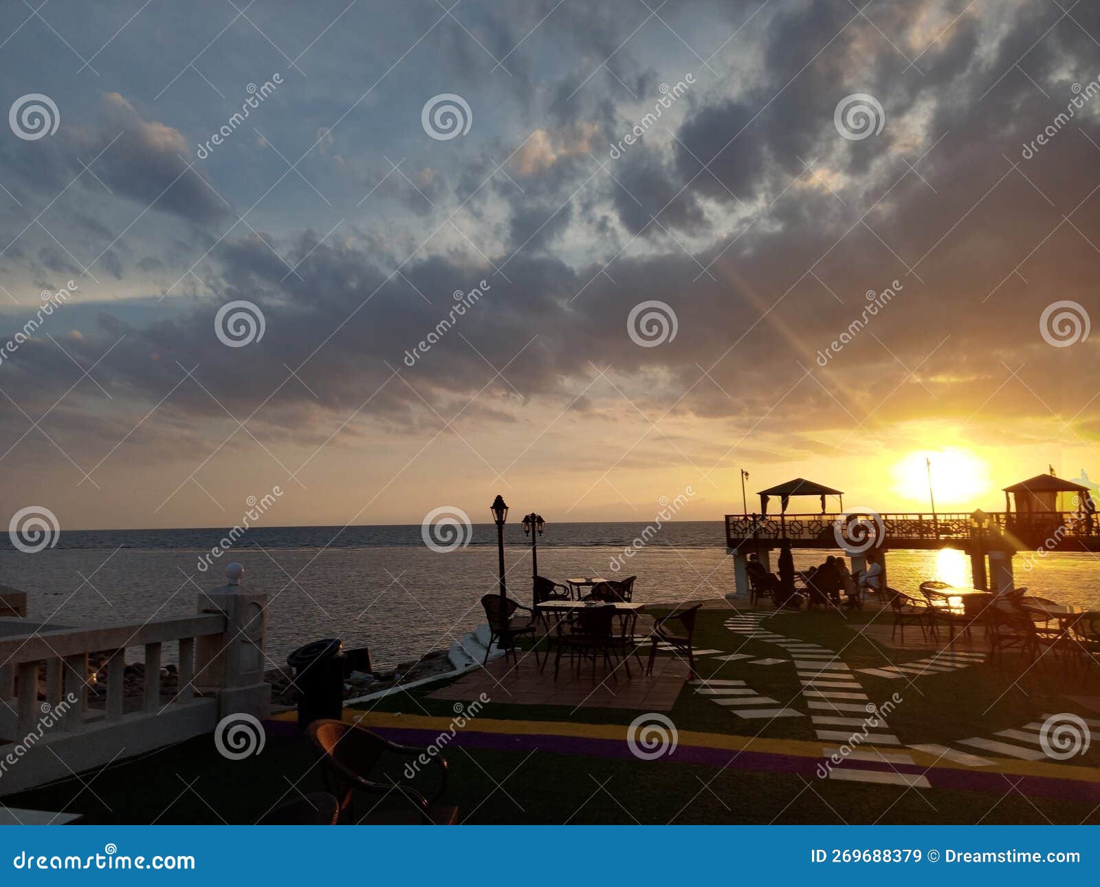 Sunset in Alith beach stock image. Image of afterglow - 269688379