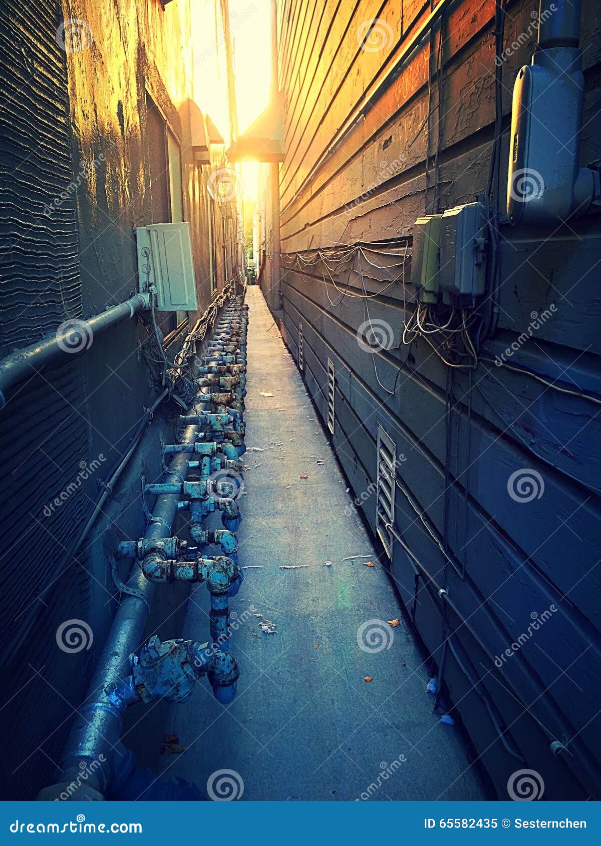 Sunset alley stock image. Image of electricity, sunset - 65582435