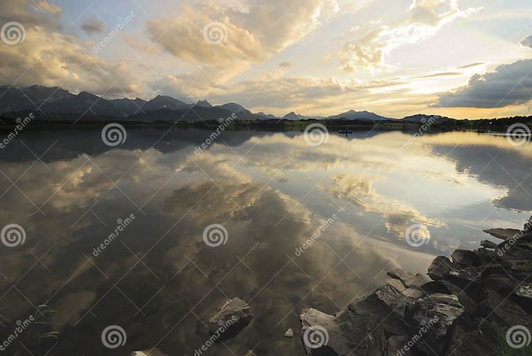 Sunset at an alpine lake stock image. Image of rural - 20671257