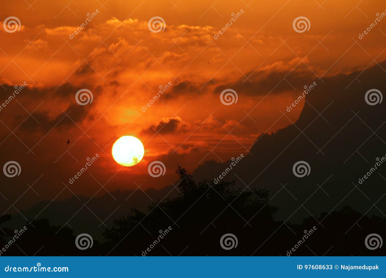 Sunset amid clouds stock image. Image of beautiful, sunset - 97608633