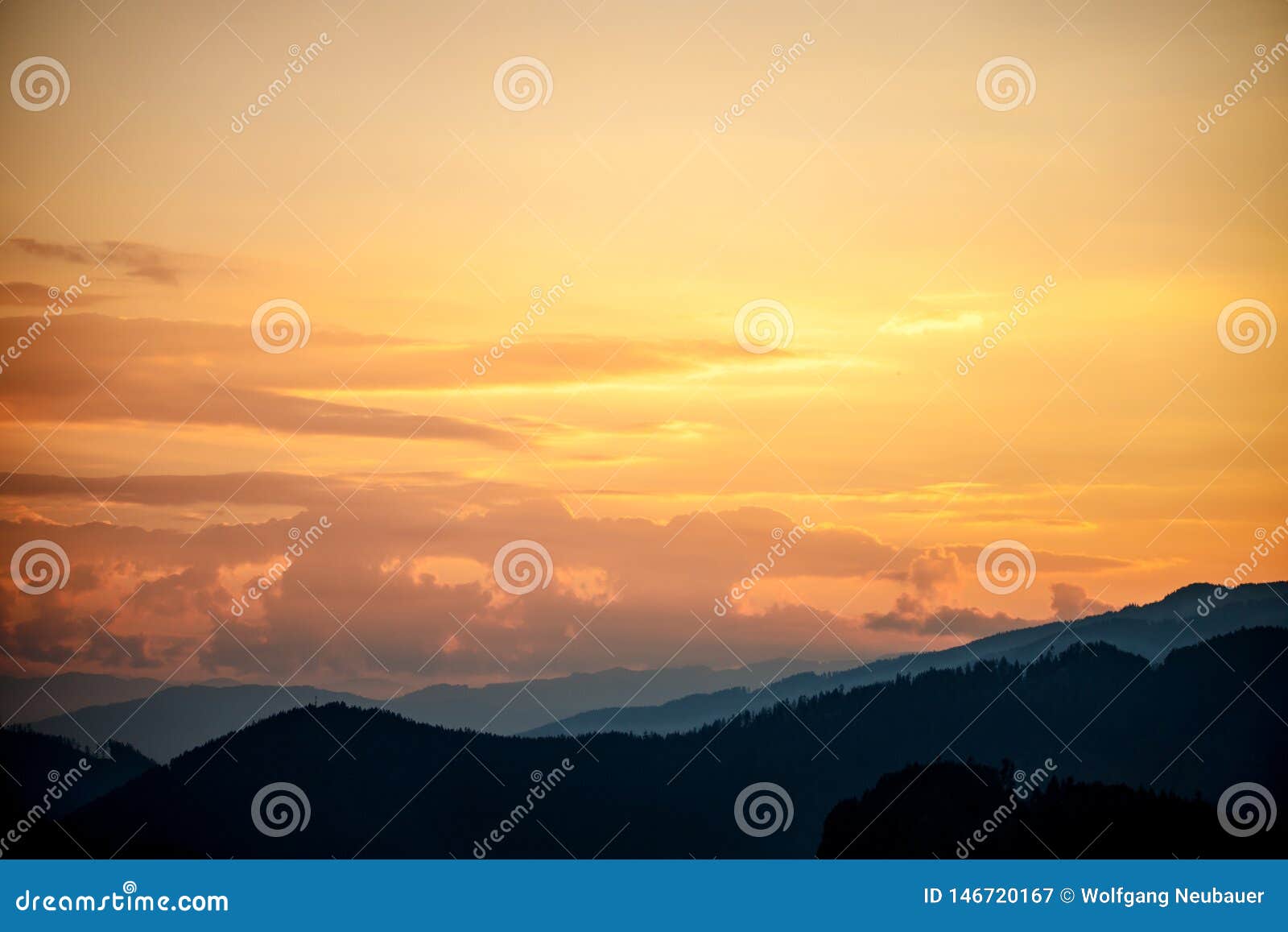 Sunset in the Austrian Alps with Silhouette of Colorful Clouds and ...
