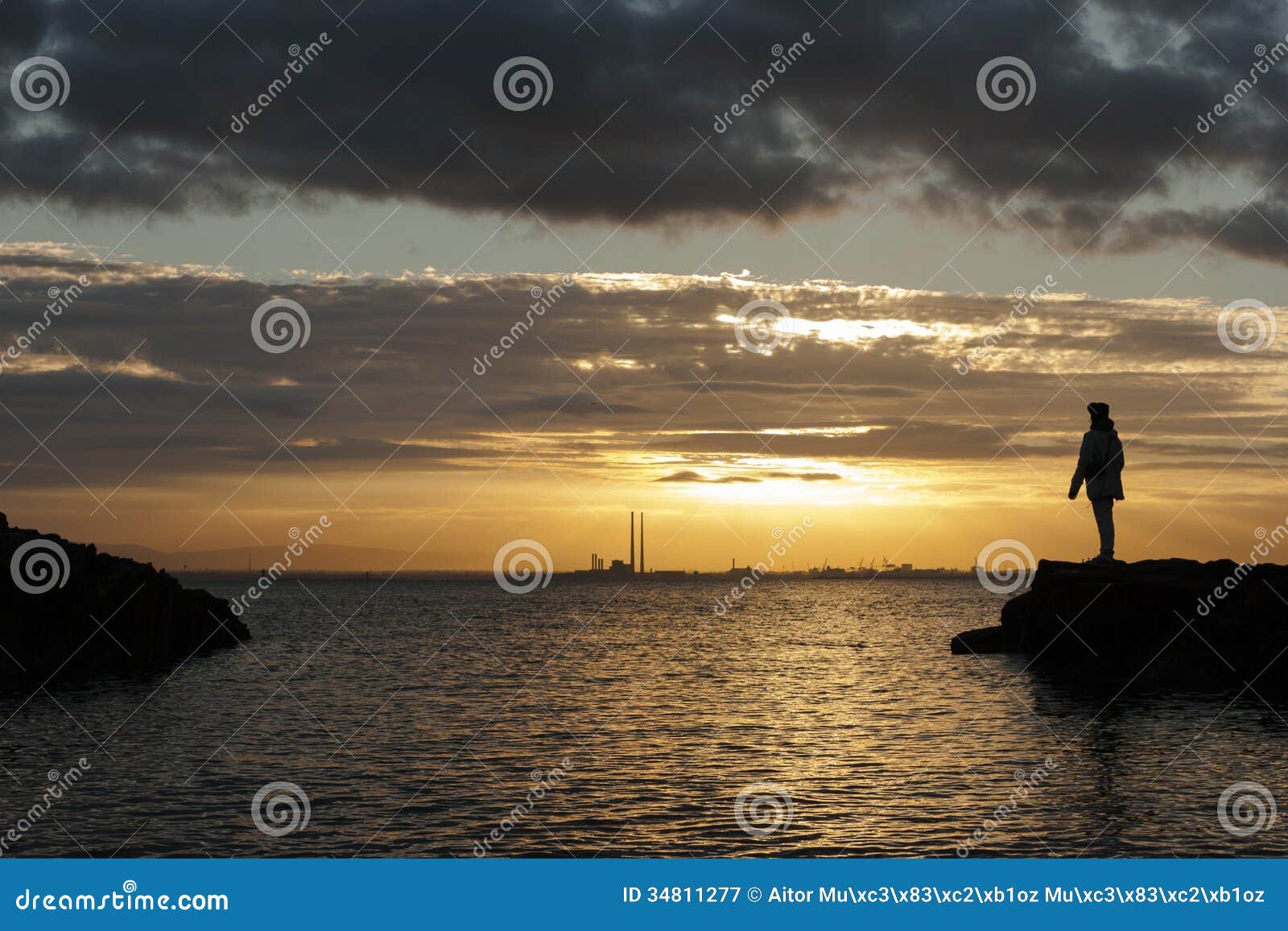 Sunset Backlit with Human Silhouette Stock Image - Image of rock ...