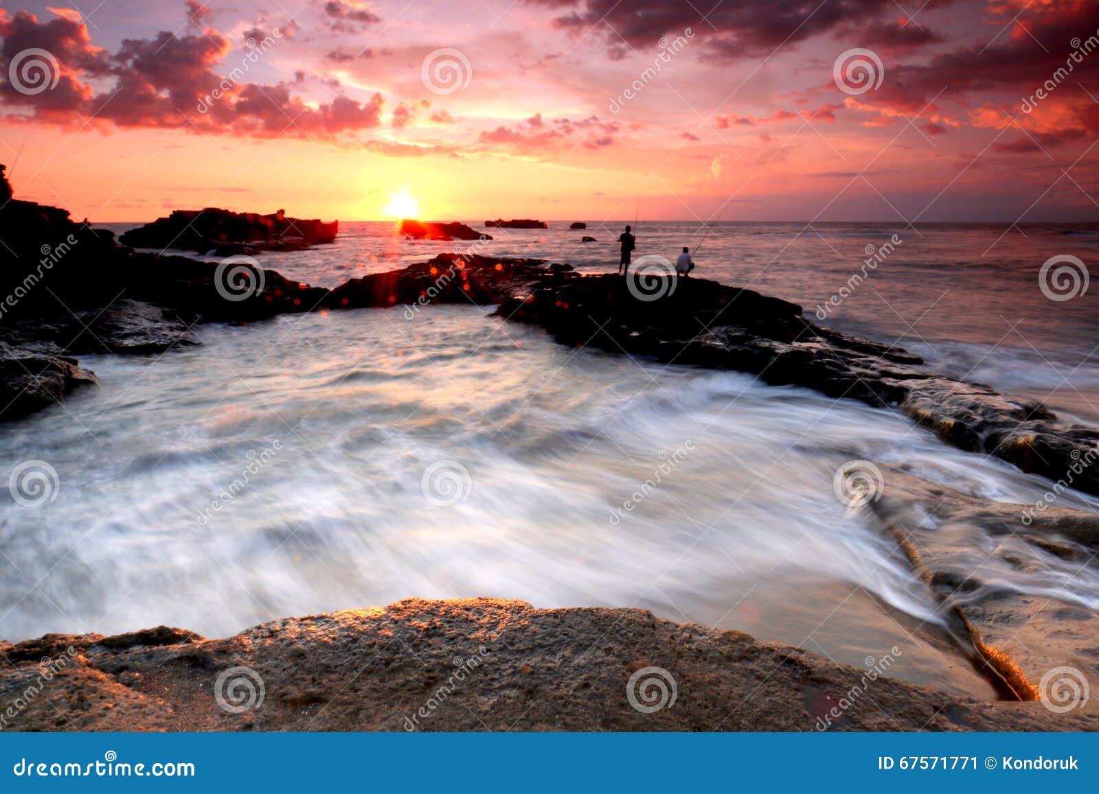 Sunset in Bali stock image. Image of motion, beach, silhouette - 67571771