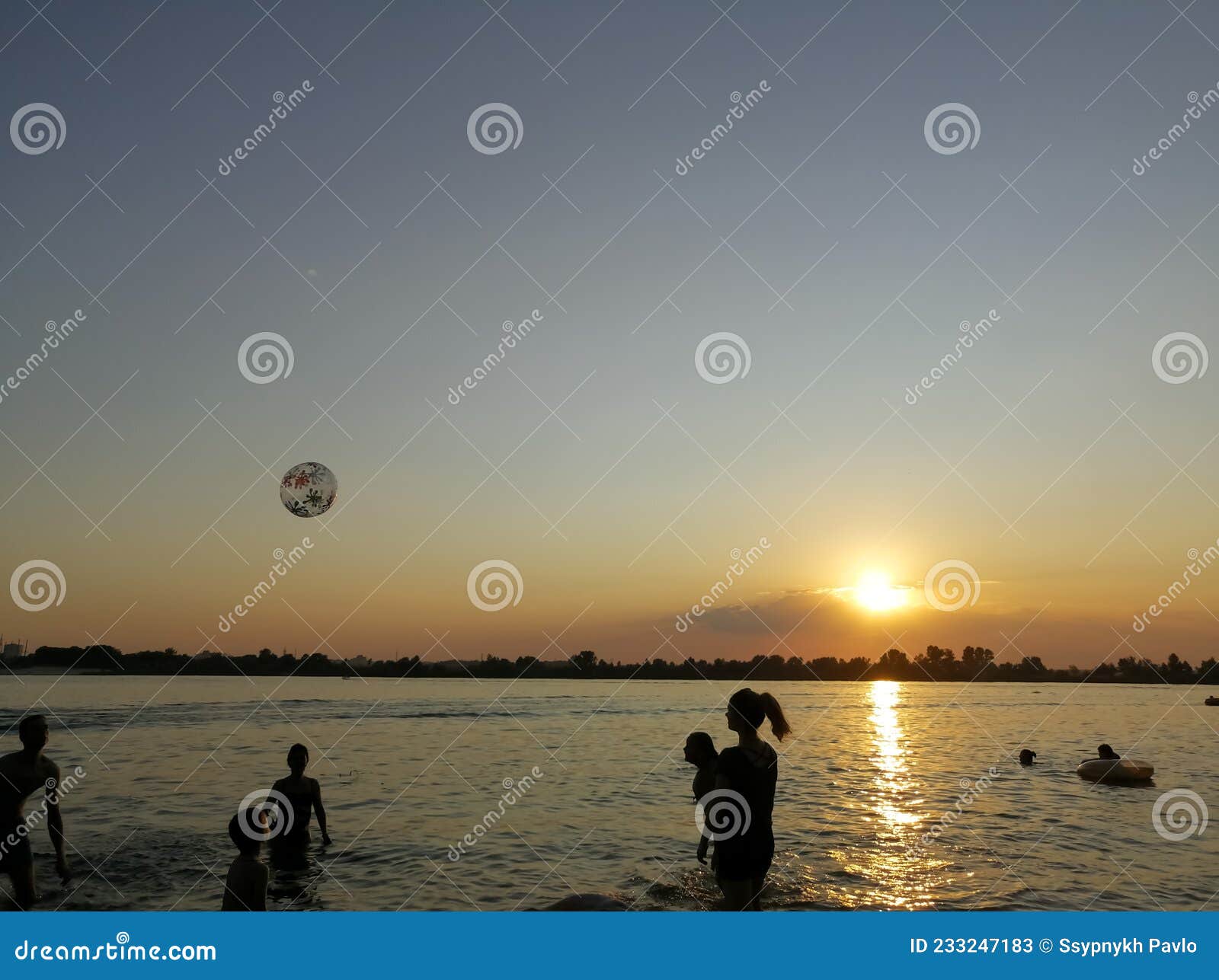 Sunset. Ball Game in the Water on the Beach. Editorial Stock Photo ...