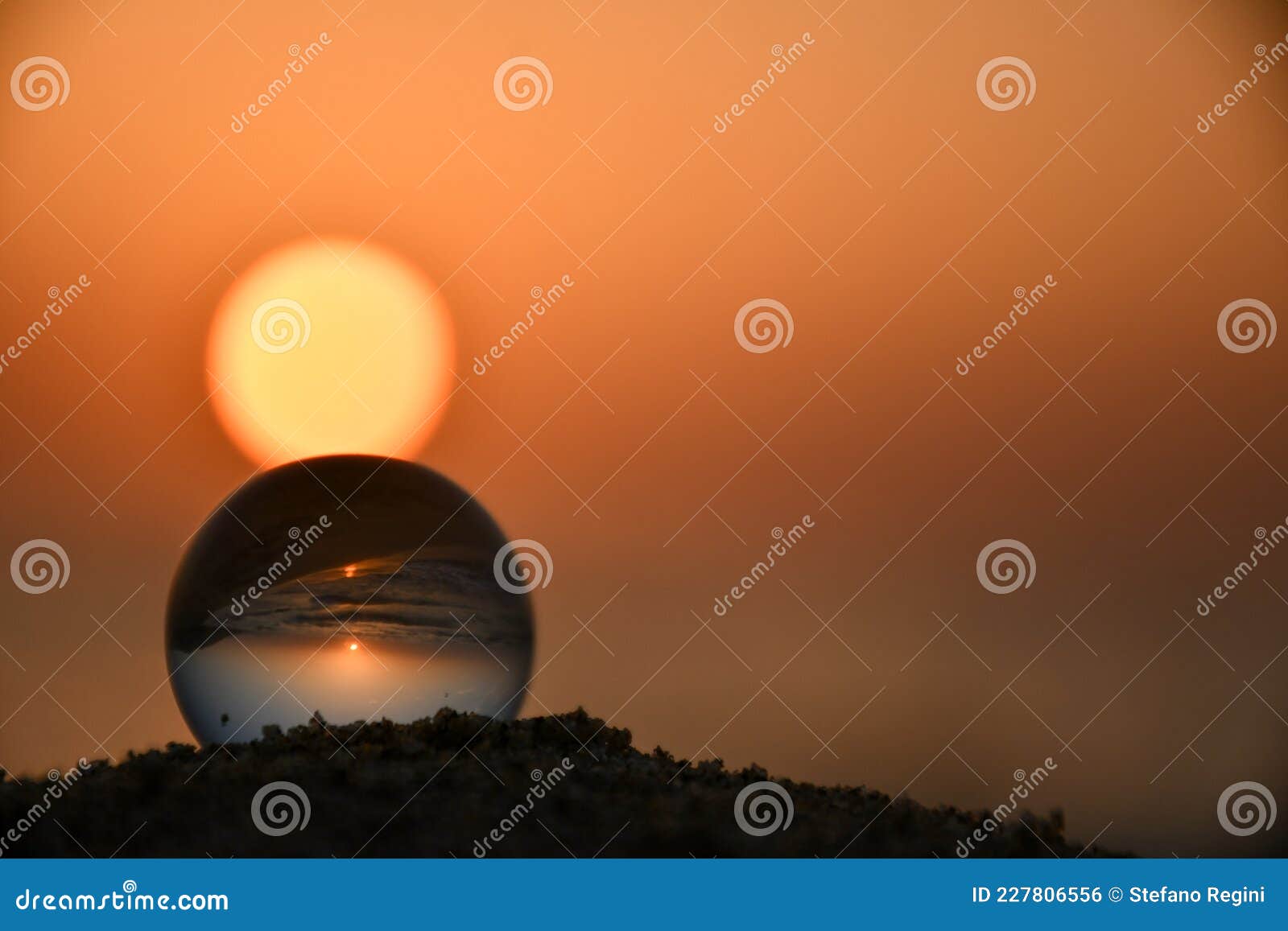 A sunset in a ball stock photo. Image of summer, beach - 227806556