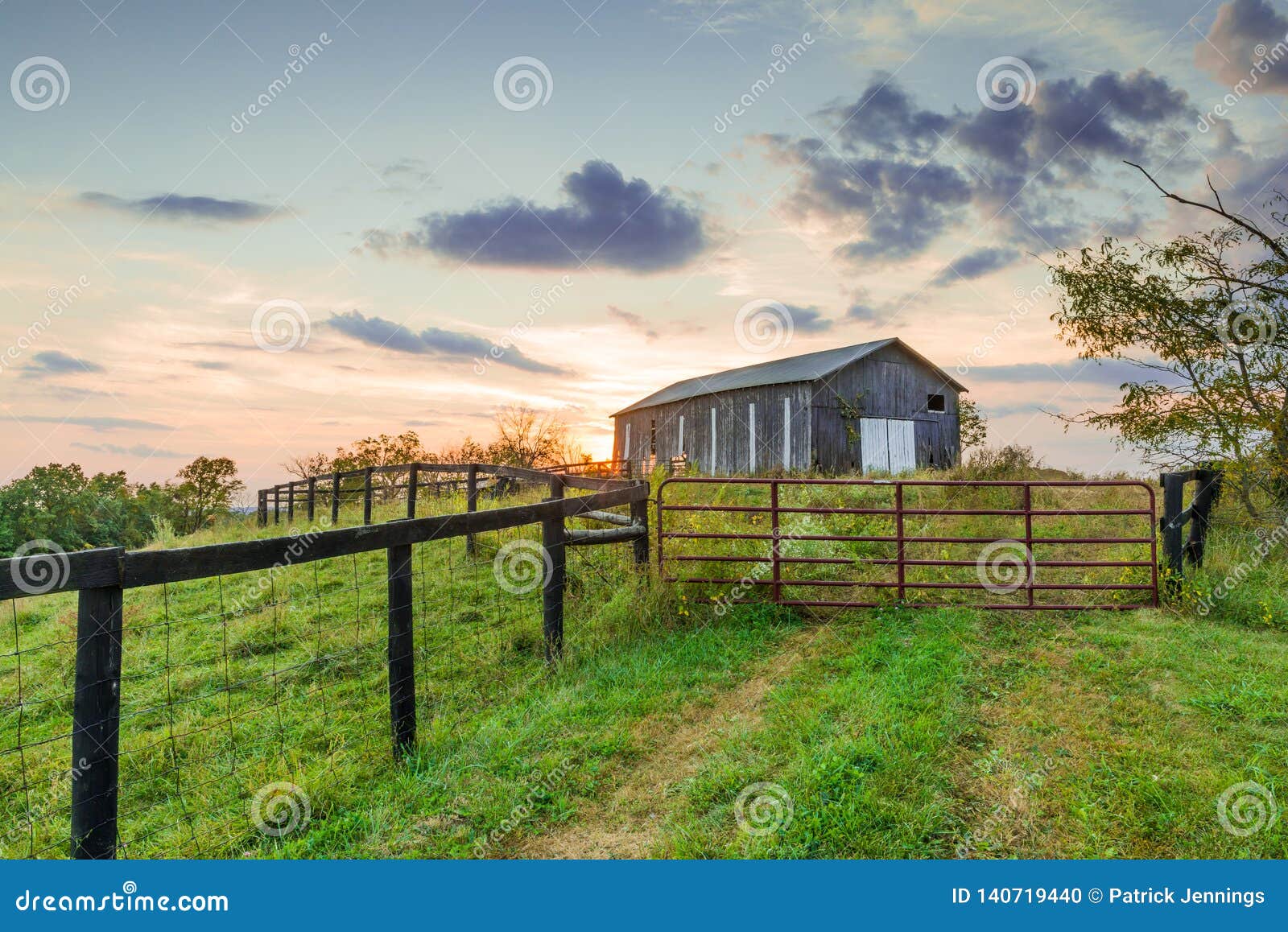 Sunset with Barn stock photo. Image of nature, clear - 140719440