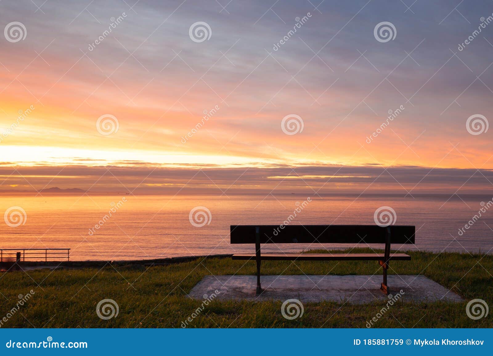 Sunset beach and bench. stock image. Image of ocean - 185881759