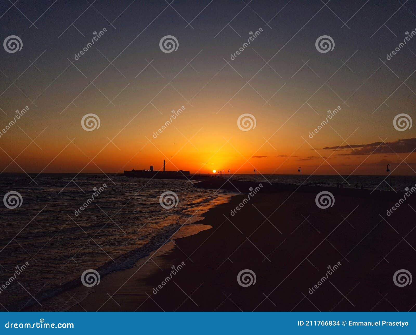 Sunset, Beach, Castle and City Stock Photo - Image of reflection, coast ...