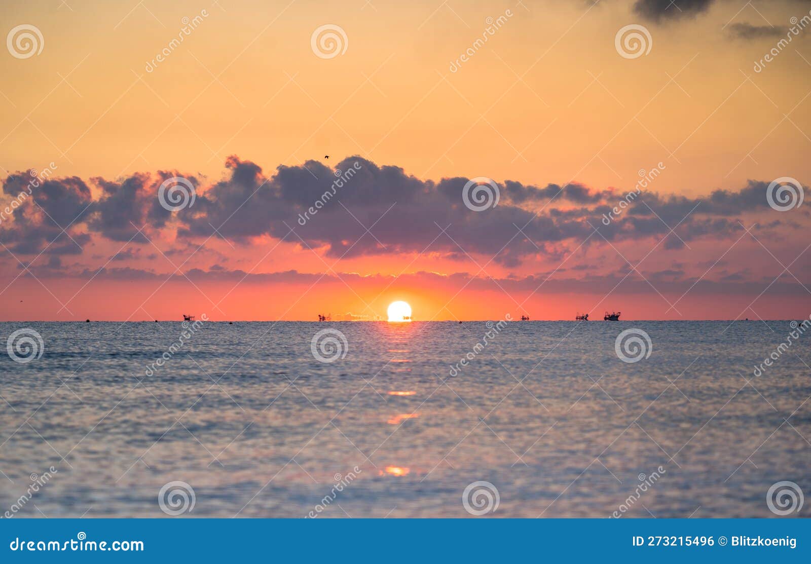 Sunset on the Beach with Clouds Stock Photo - Image of beautiful ...