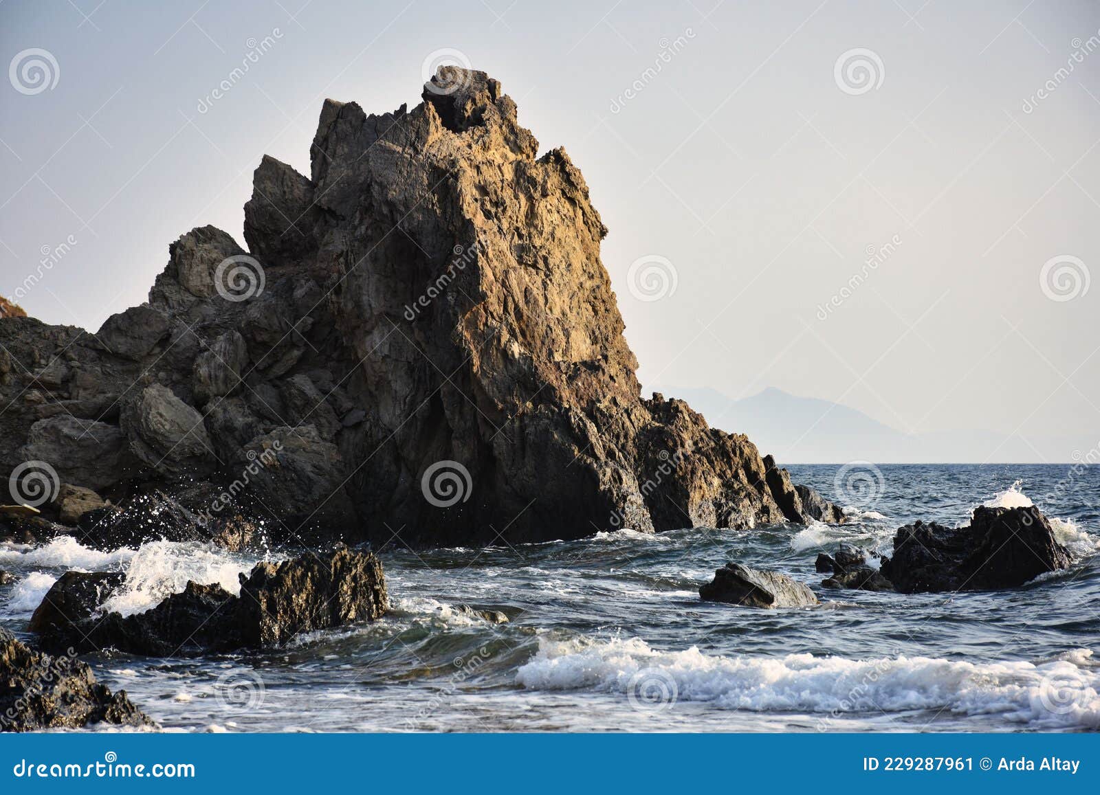 Sunset on the Beach with a Huge Rock Stock Image - Image of travel ...
