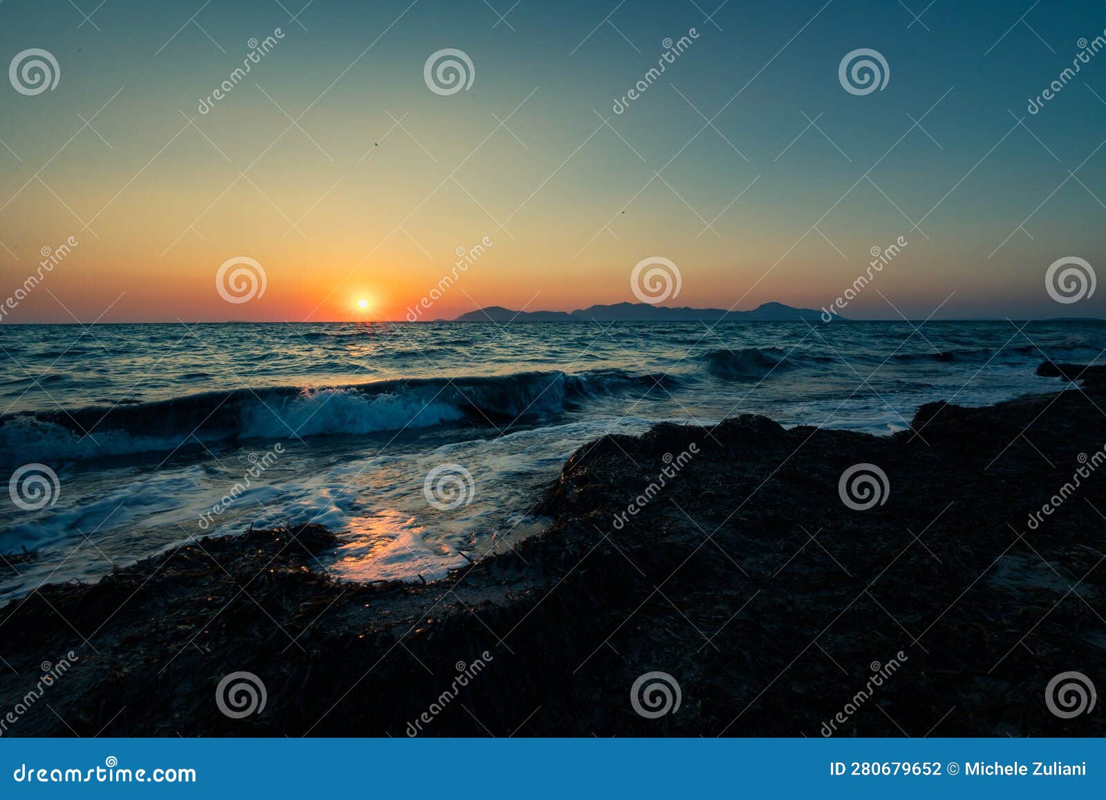 Sunset at the beach in kos stock photo. Image of architecture - 280679652