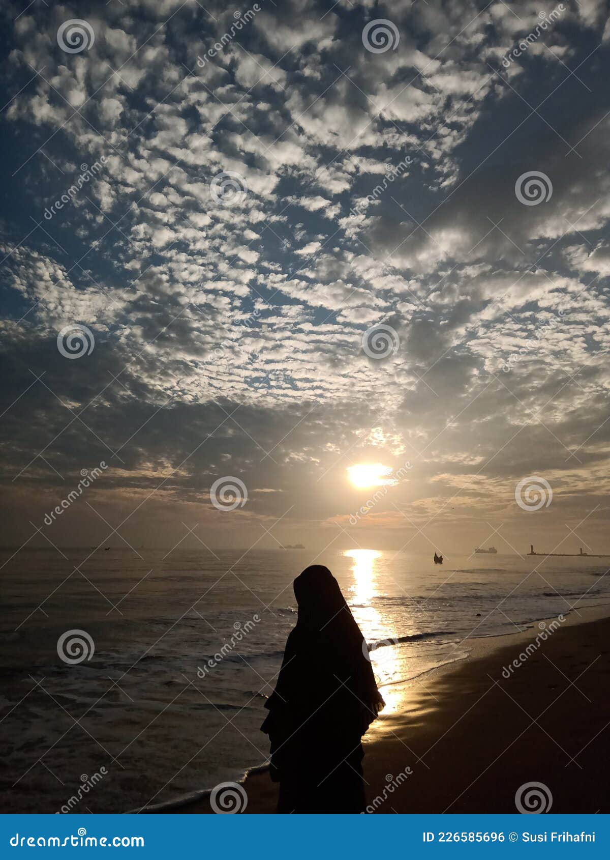 Sunset beach and people stock photo. Image of dawn, people - 226585696
