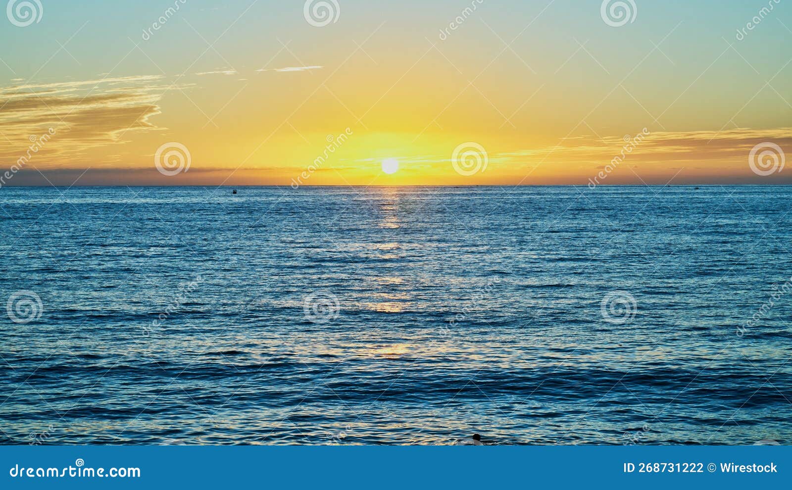 Sunset on the Beach and the Sun is Setting on the Horizon Stock Photo ...